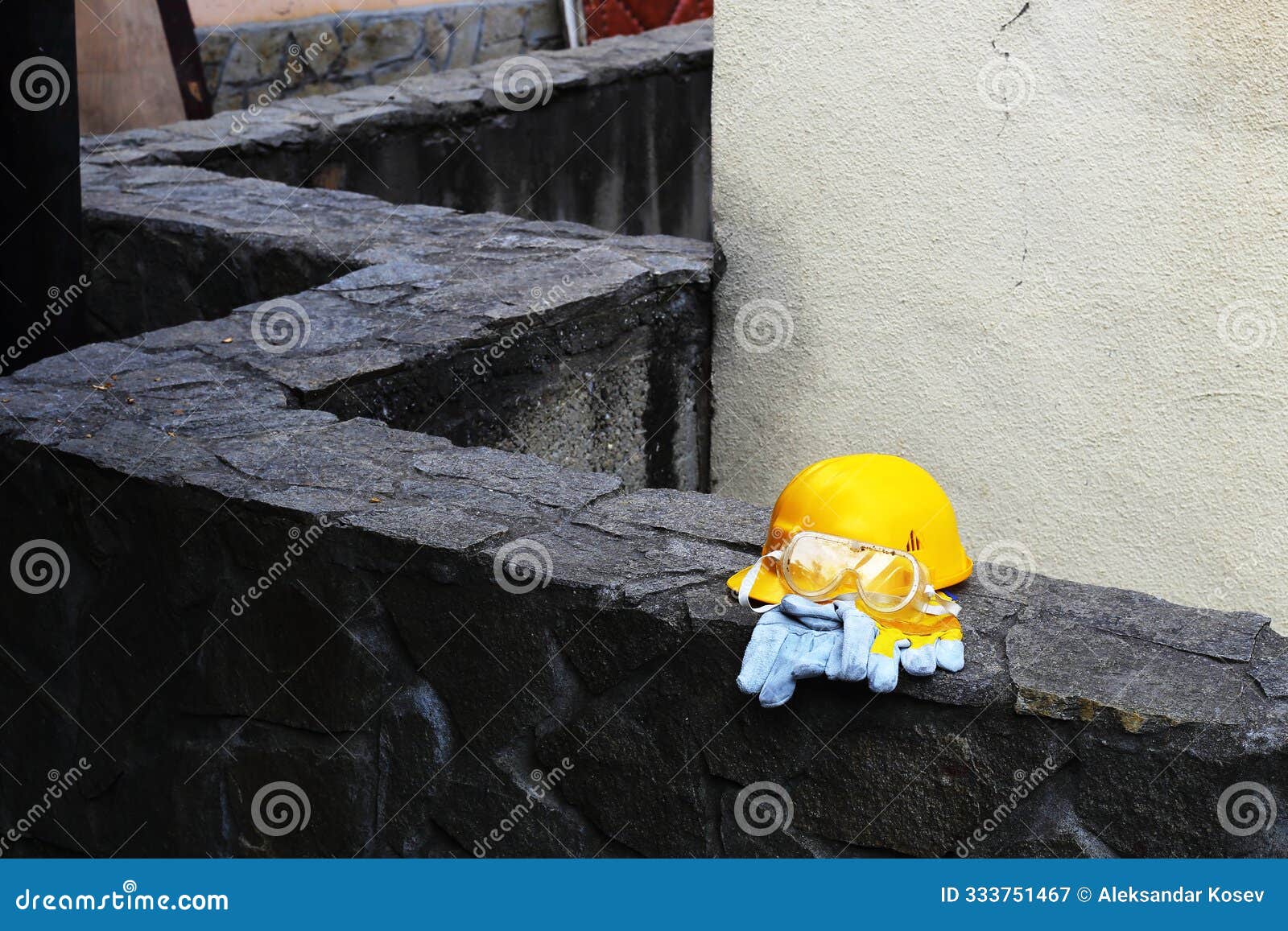 Yellow helmet at work site stock image. Image of protection - 333751467
