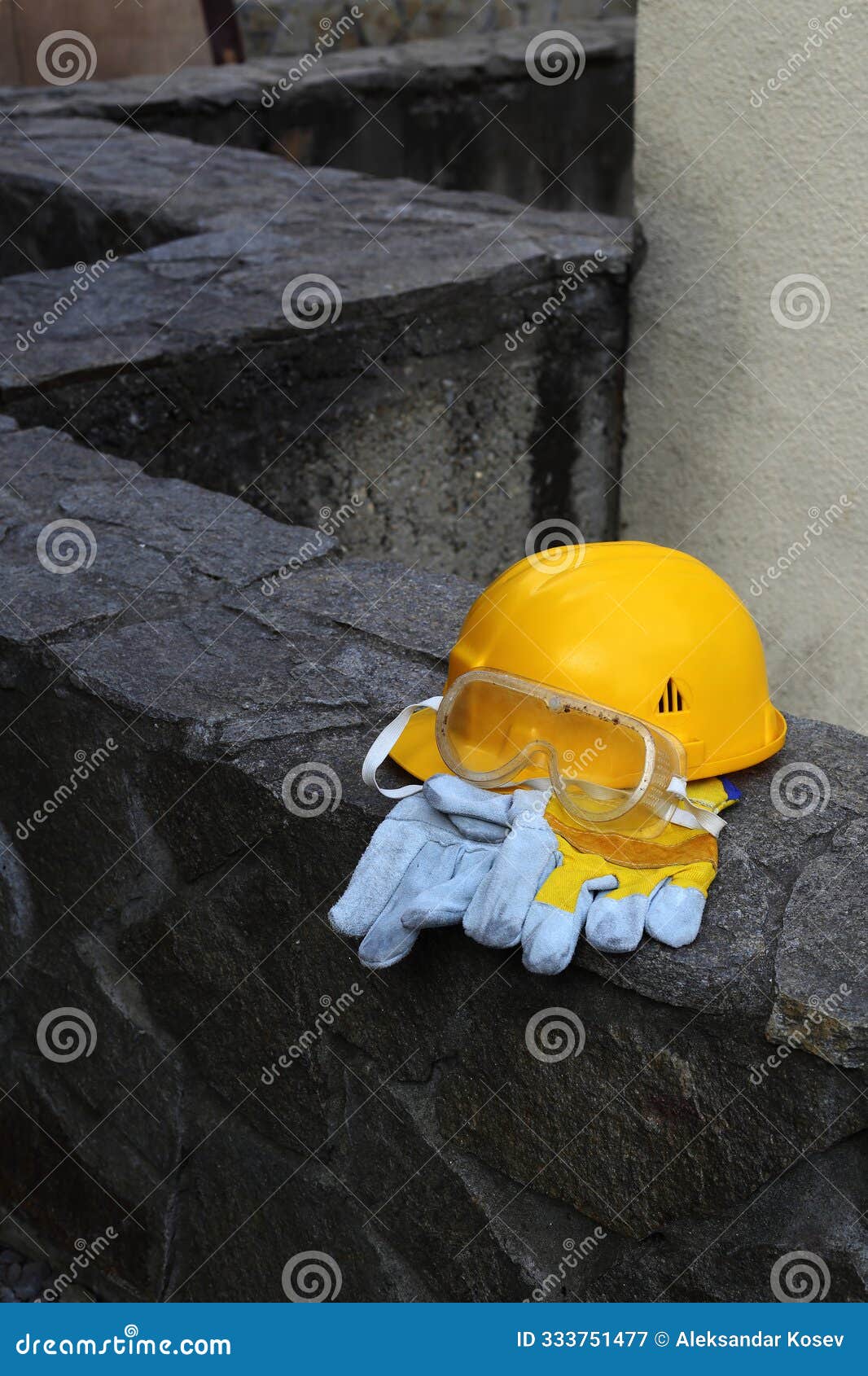 Yellow helmet at work site stock image. Image of clothing - 333751477