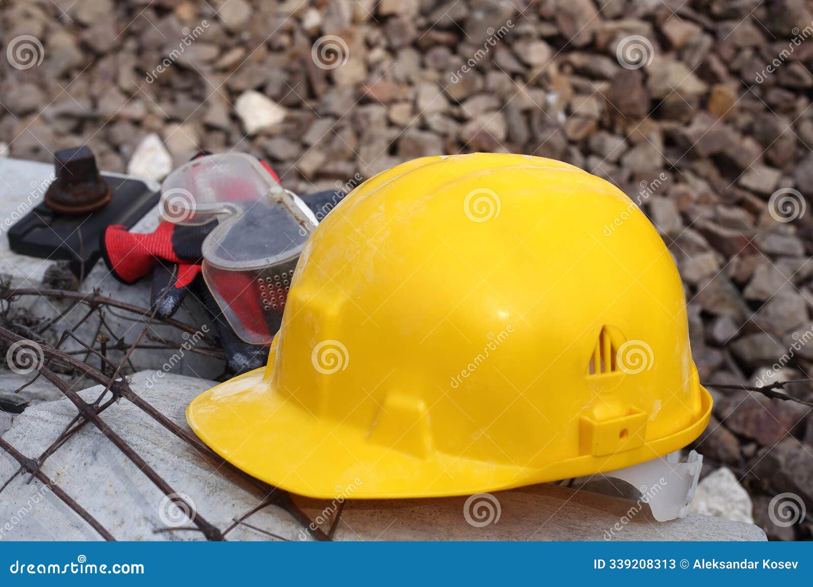 Yellow Helmet on a Work Site Stock Image - Image of industrial, drink ...
