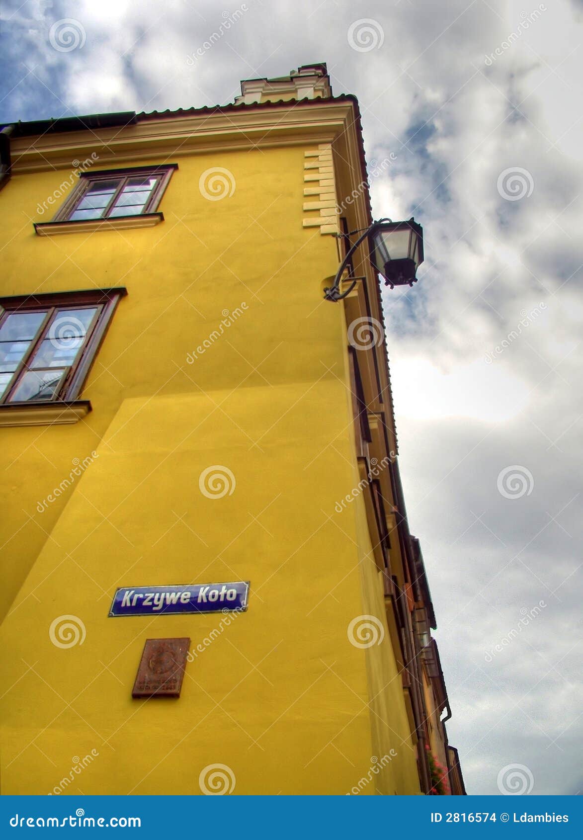 Yellow House at Street Corner Stock Photo - Image of building, exterior ...