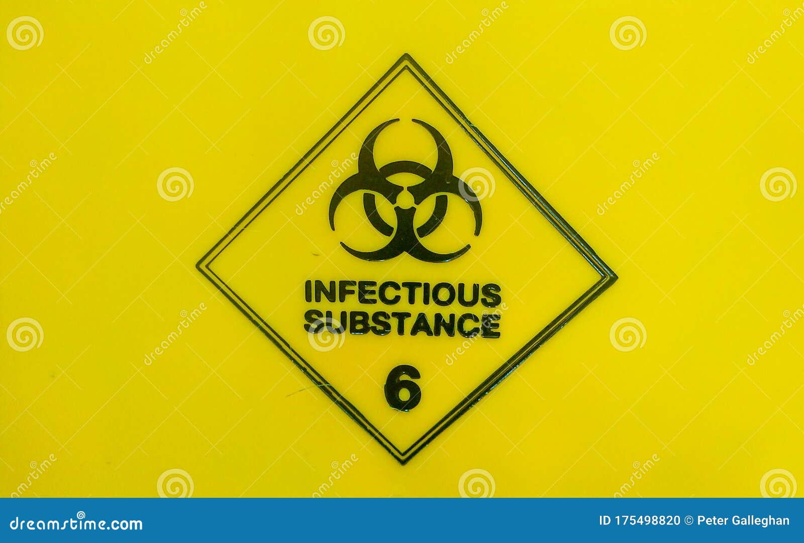 Yellow Infectious Substance Sign on a Hospital Bin Stock Photo - Image ...