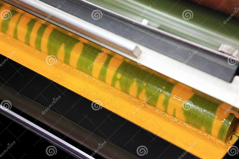 Yellow Ink in a Printing Press Stock Photo - Image of colorful, news ...