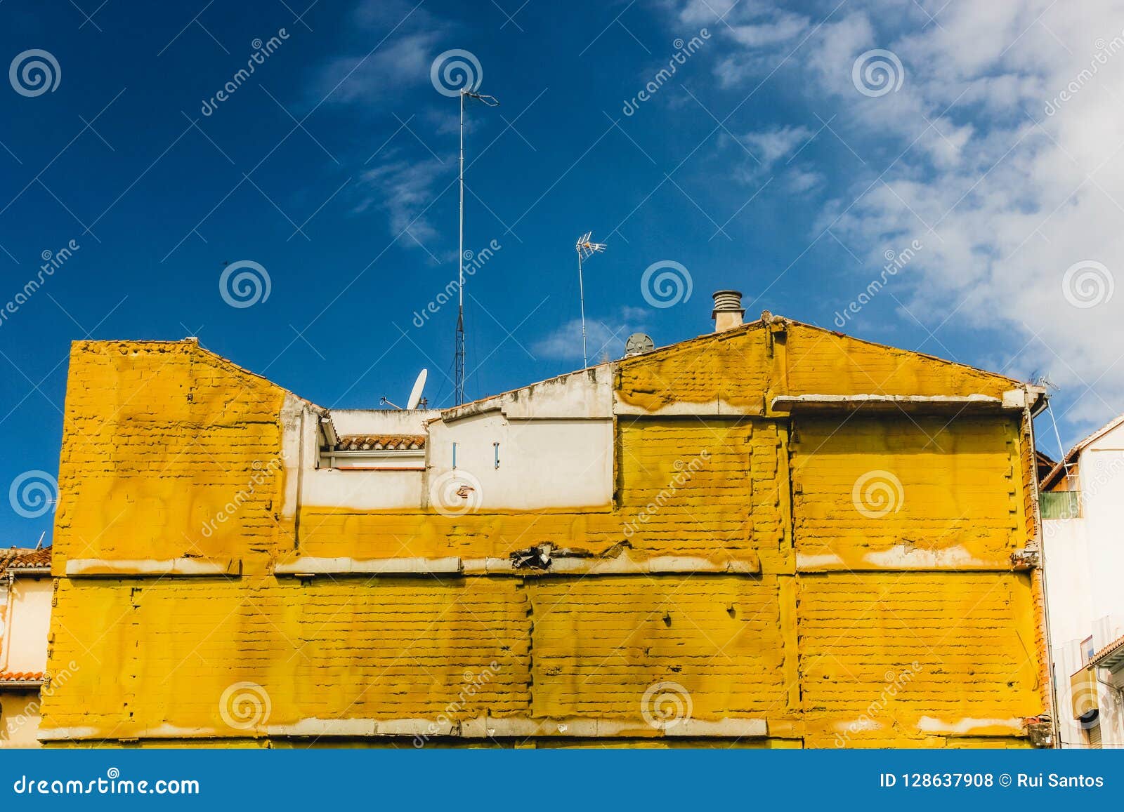 Yellow Insulating Material on Building in Granada, Spain Stock Photo ...