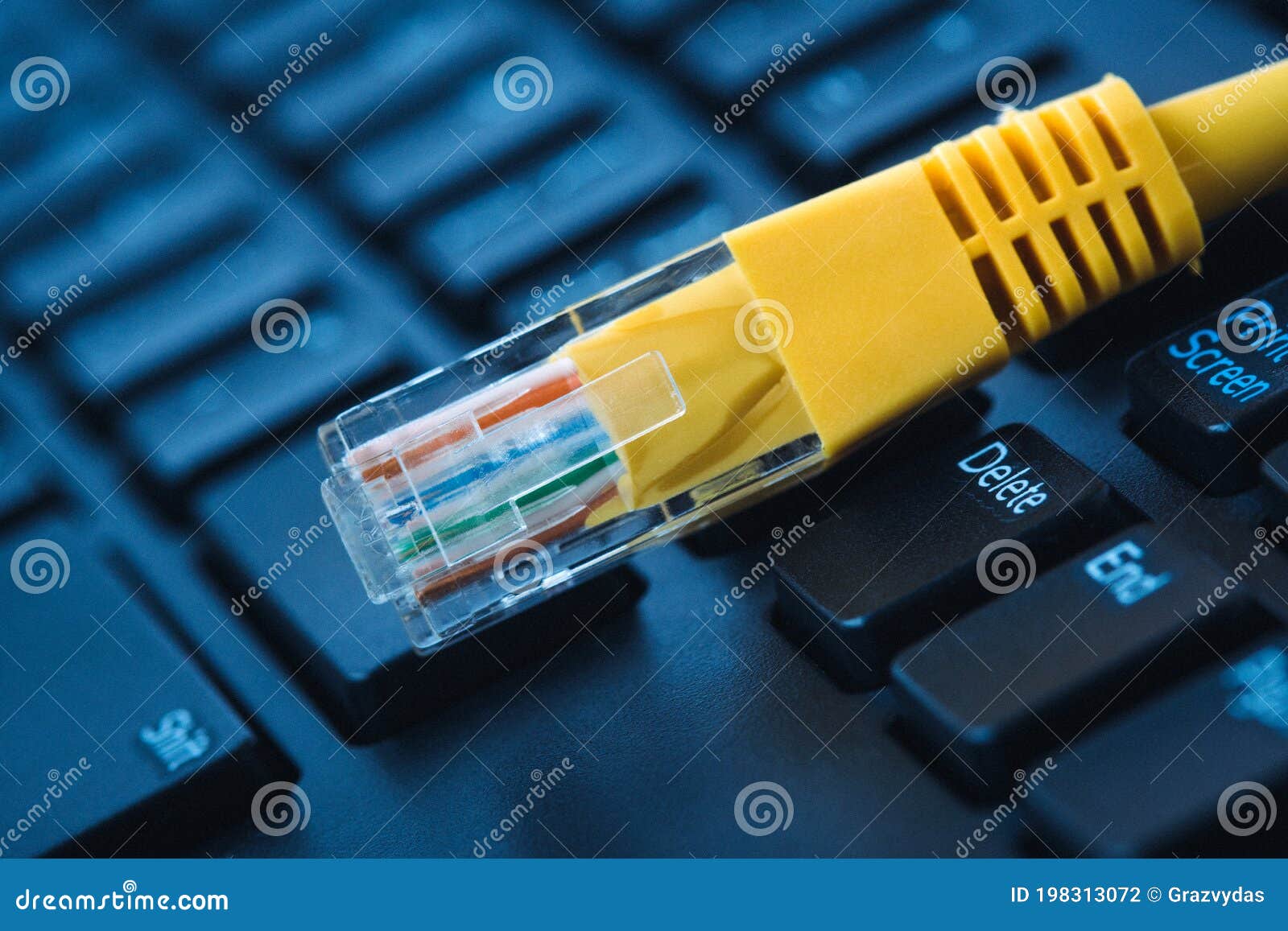 Yellow Internet Cable on Computer Keyboard Stock Photo - Image of ...