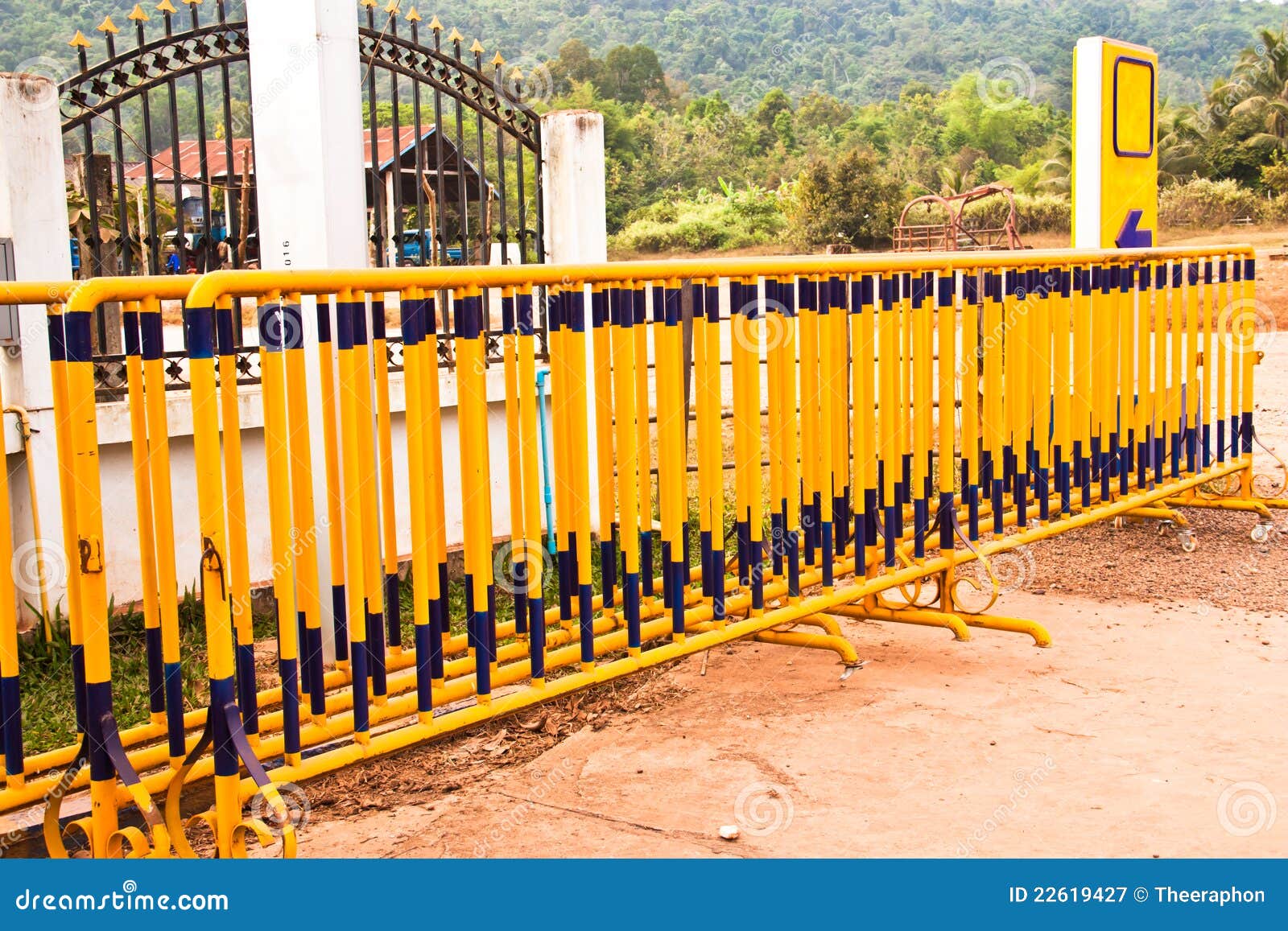 Yellow iron fence. stock image. Image of shadow, house - 22619427