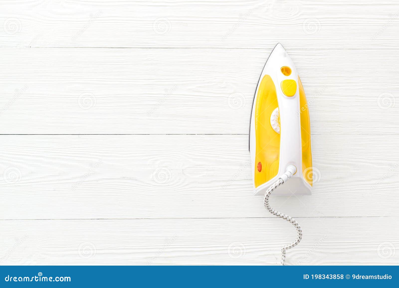 Yellow Iron on Ironing Board. Top View, Copy Space Stock Photo - Image ...