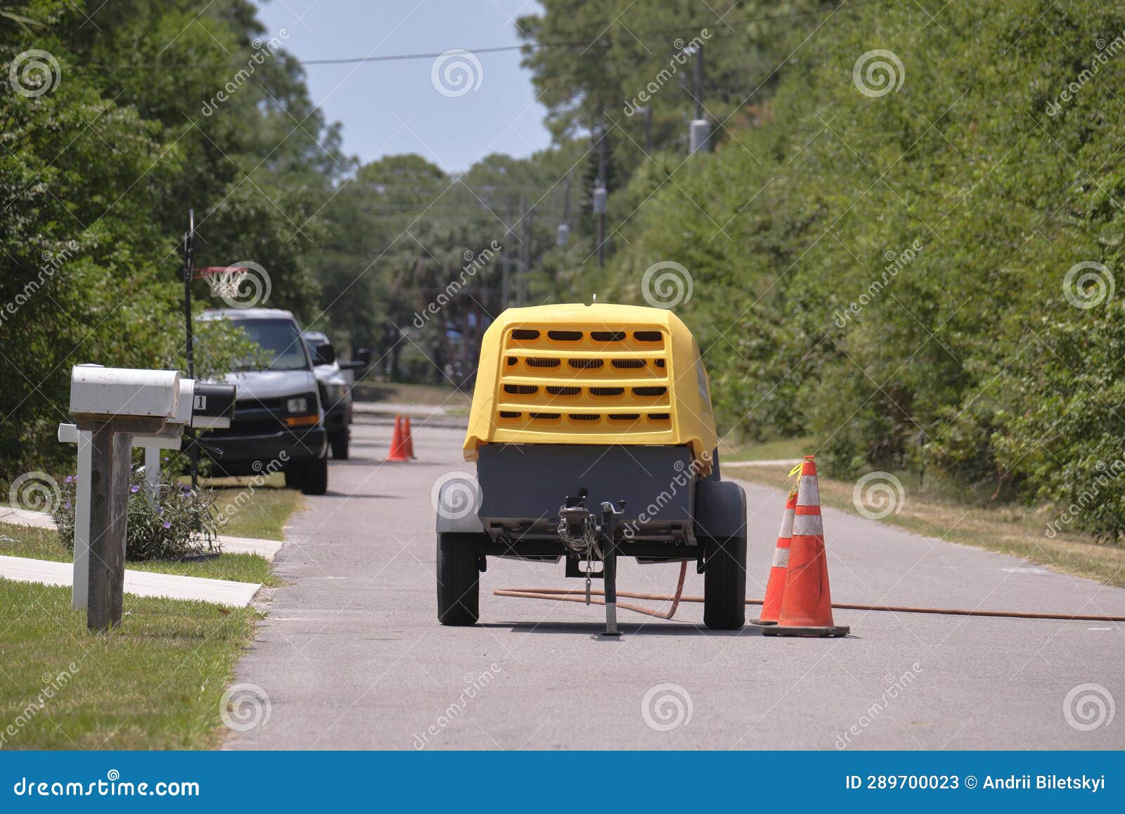 Yellow Jackhammer Machine with Compressor Trailer on Road Construction ...