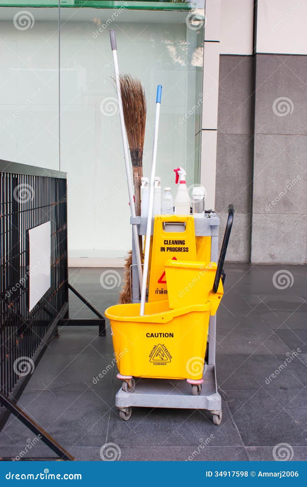 Yellow janitor cart. stock photo. Image of broom, janitor - 34917598