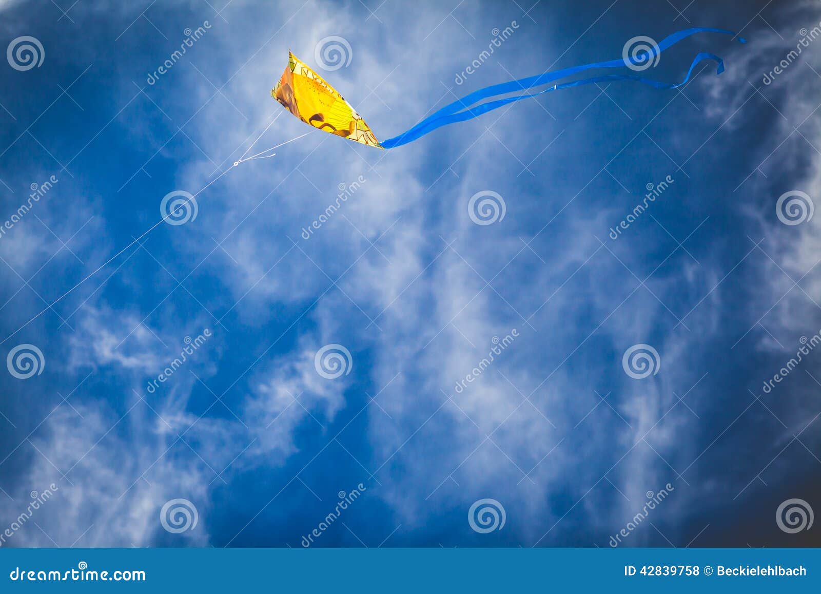 Yellow Kite Against Bright Blue Sky Stock Photo - Image of spring ...