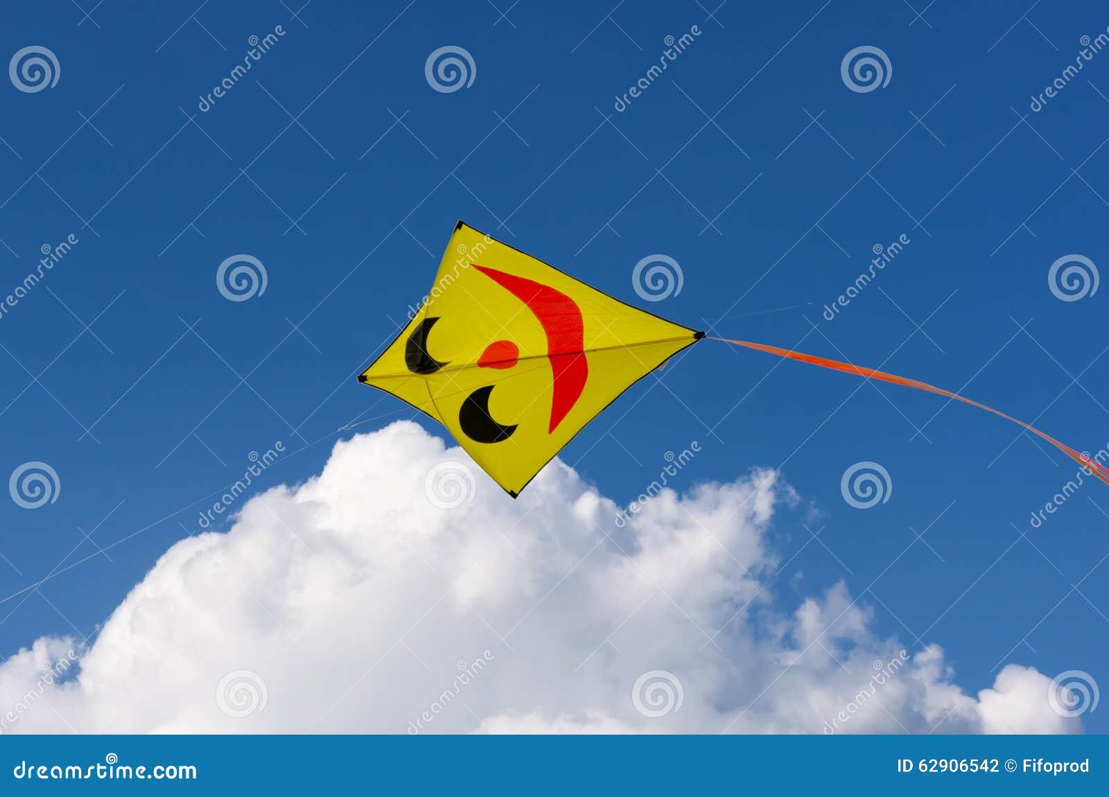 Yellow Kite with Smiling Face Isolated on Blue Sky Stock Photo - Image ...