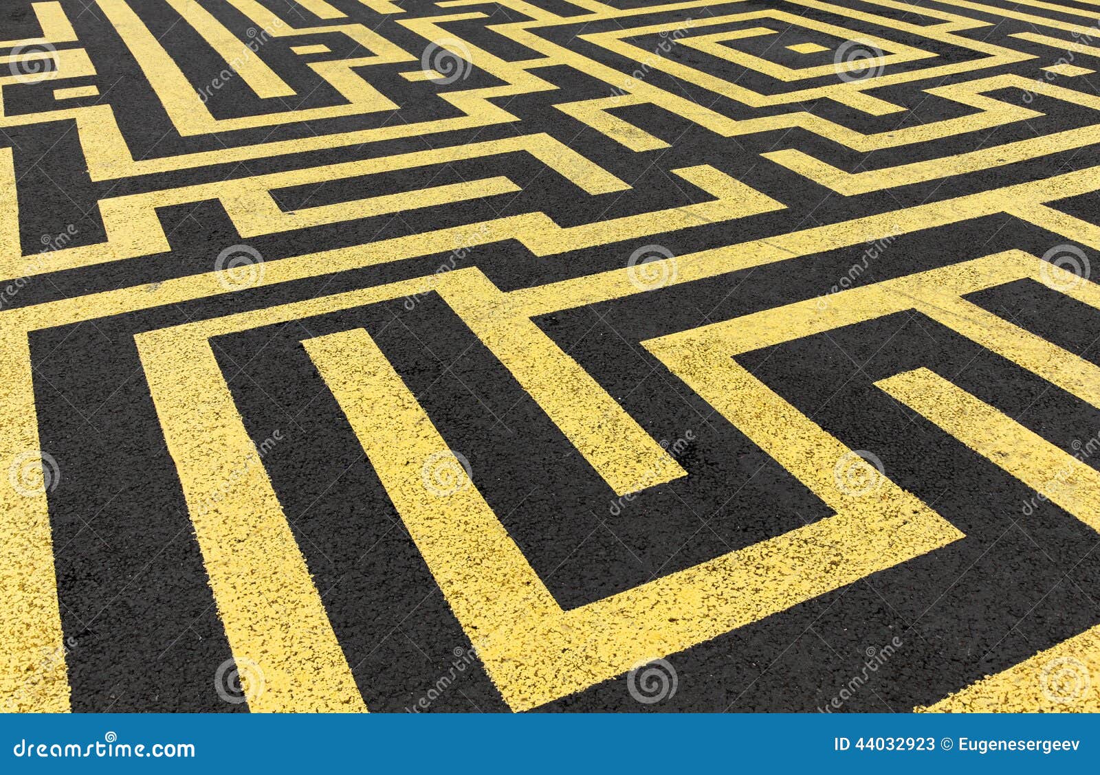 Yellow Labyrinth Painted on a Black Asphalt Stock Image - Image of ...