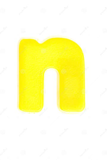 Yellow letter n stock image. Image of character, background - 6267427
