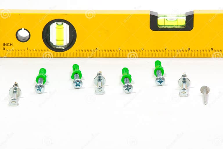 Yellow Level and Screws Isolated Stock Image - Image of inch, object ...