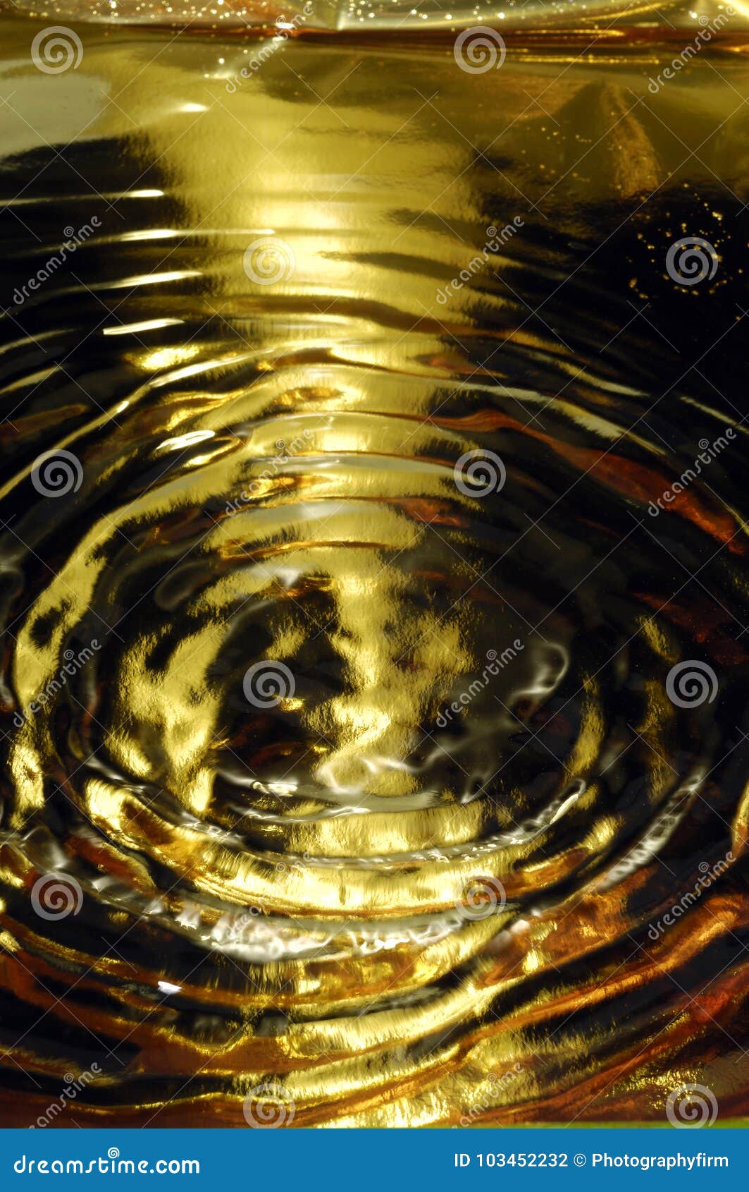 Yellow Light Reflecting on Water Ripples or Waves Stock Photo - Image ...