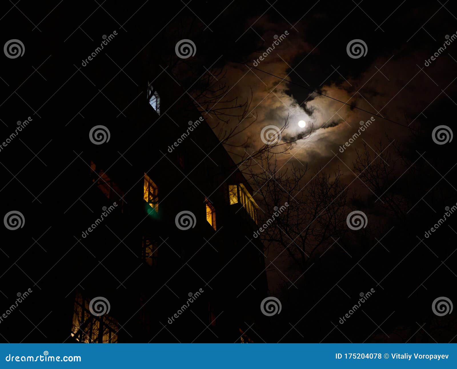 Yellow Light in the Windows of a Multi-storey Building on the ...