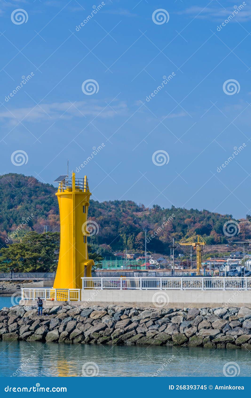 Yellow Lighthouse on End of Concrete Pier Stock Image - Image of port ...