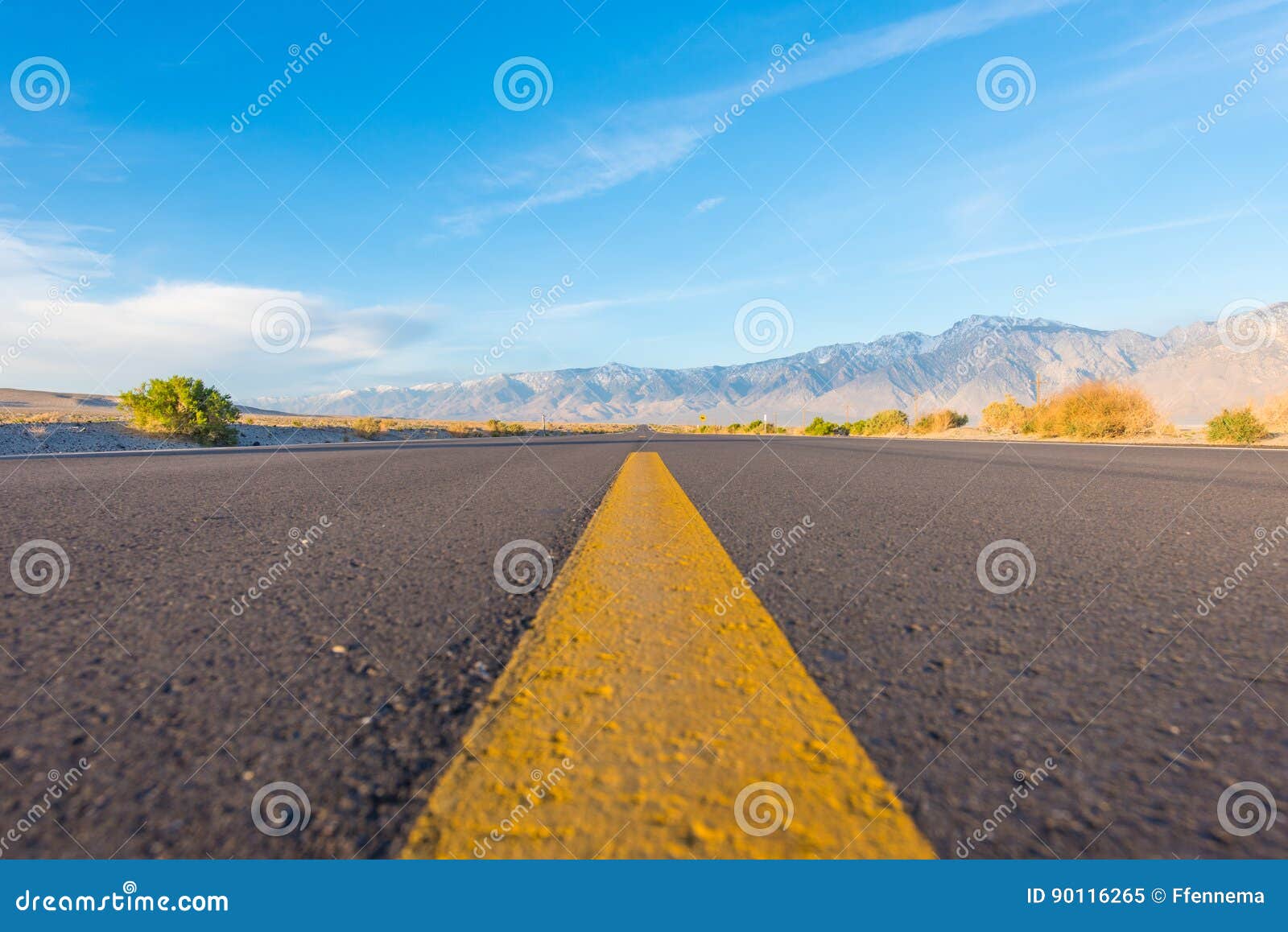 Yellow Line in Middle of Road in Desert Stock Image - Image of road ...