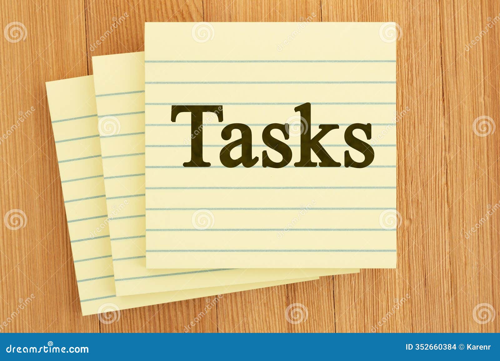 Yellow Lined Sticky Notes with Tasks Written on Wooden Desk Stock Photo ...