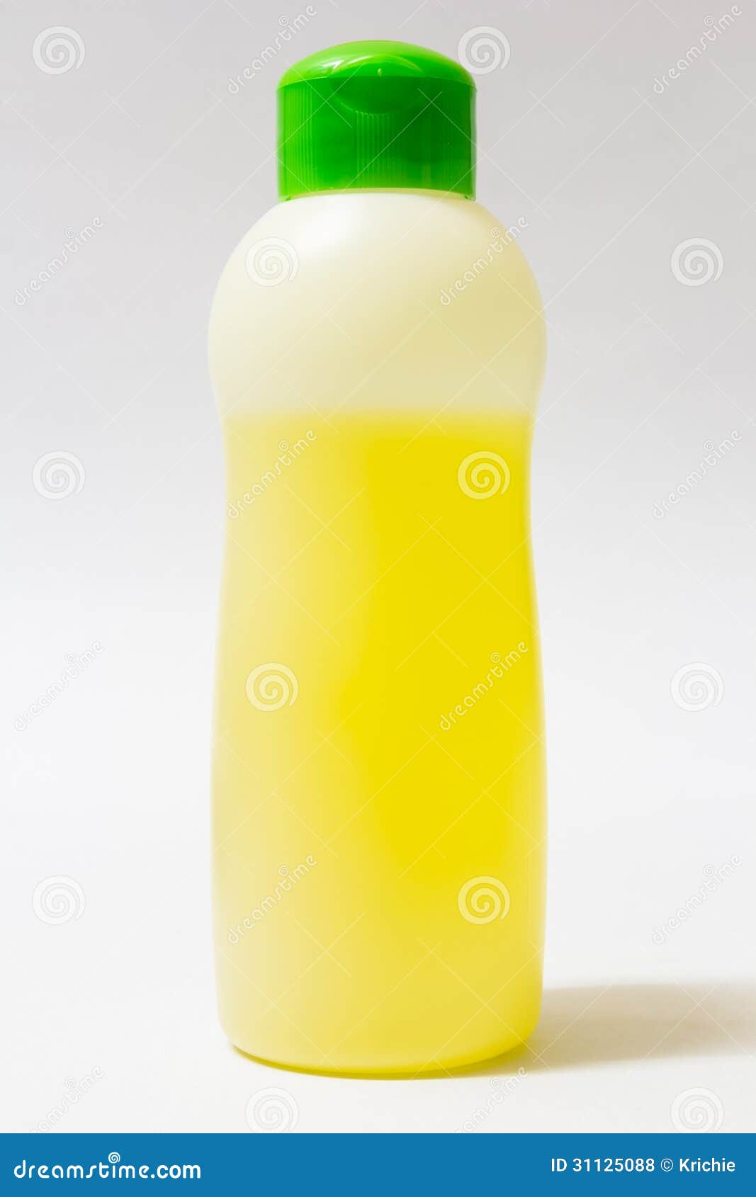 Yellow liquid in bottle stock photo. Image of bottle - 31125088