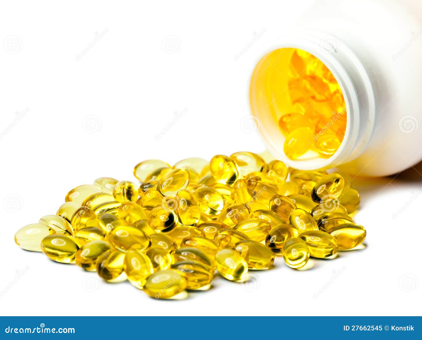 Yellow Liquid Capsules Lie Near a Bottle Stock Image - Image of ...