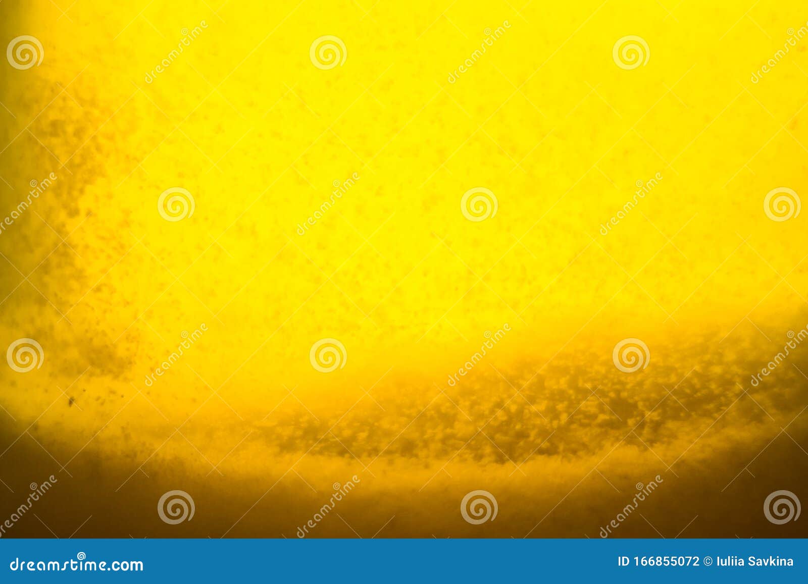 Yellow Liquid Honey Texture Close Up with Some Solid Particles in ...