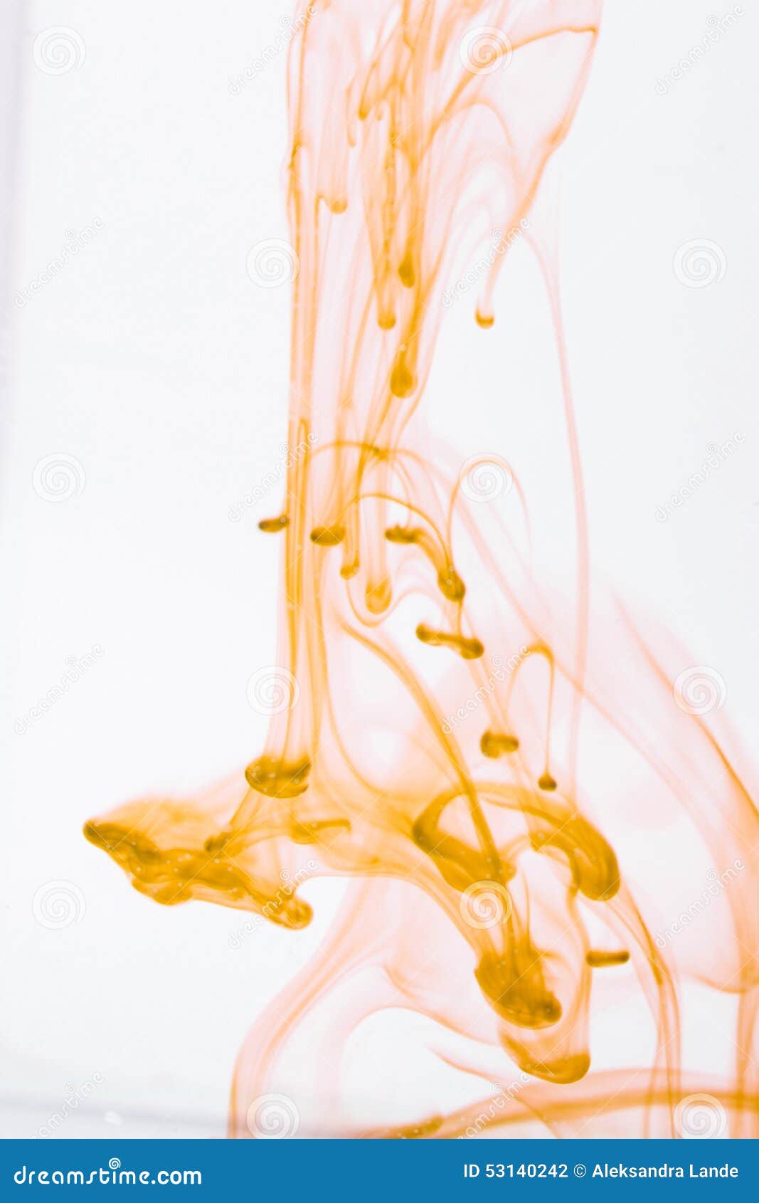 Yellow liquid in water stock photo. Image of curve, mist - 53140242
