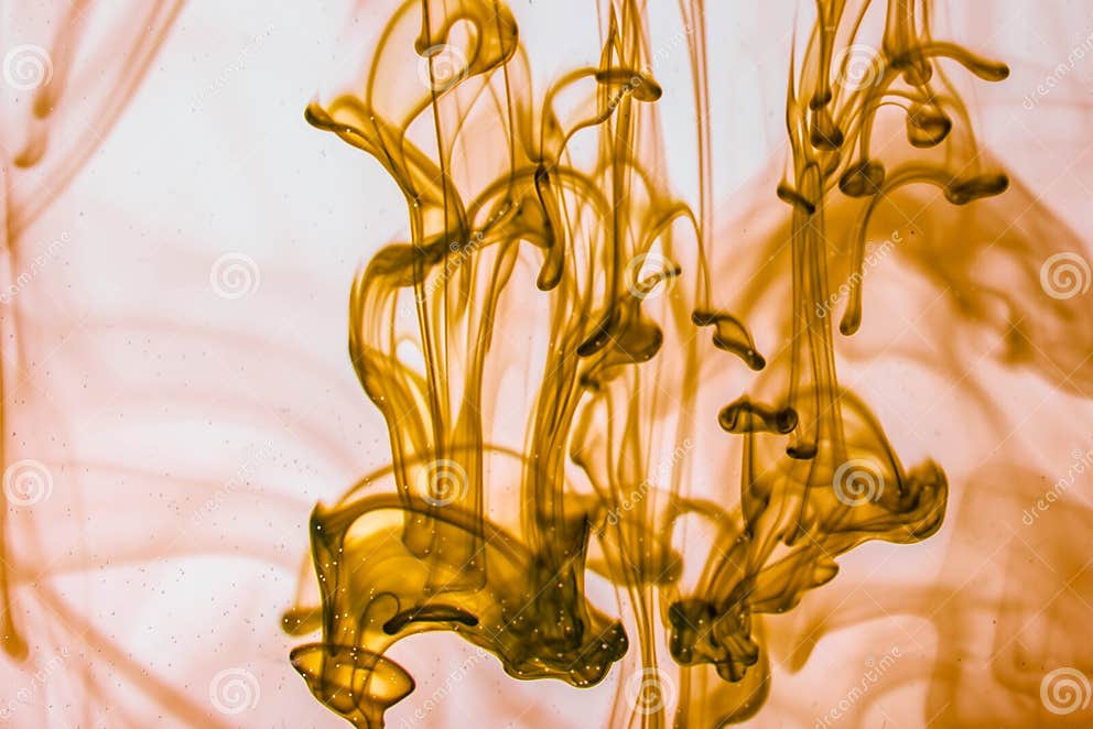 Yellow liquid in water stock image. Image of abstract - 53140289