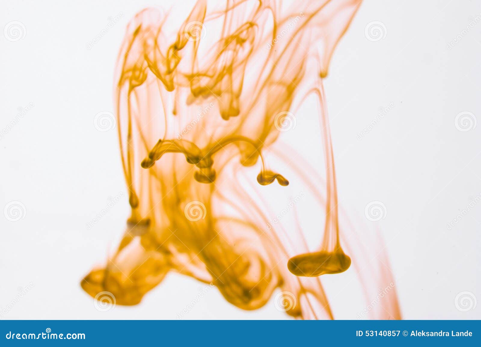 Yellow liquid in water stock image. Image of blend, forms - 53140857