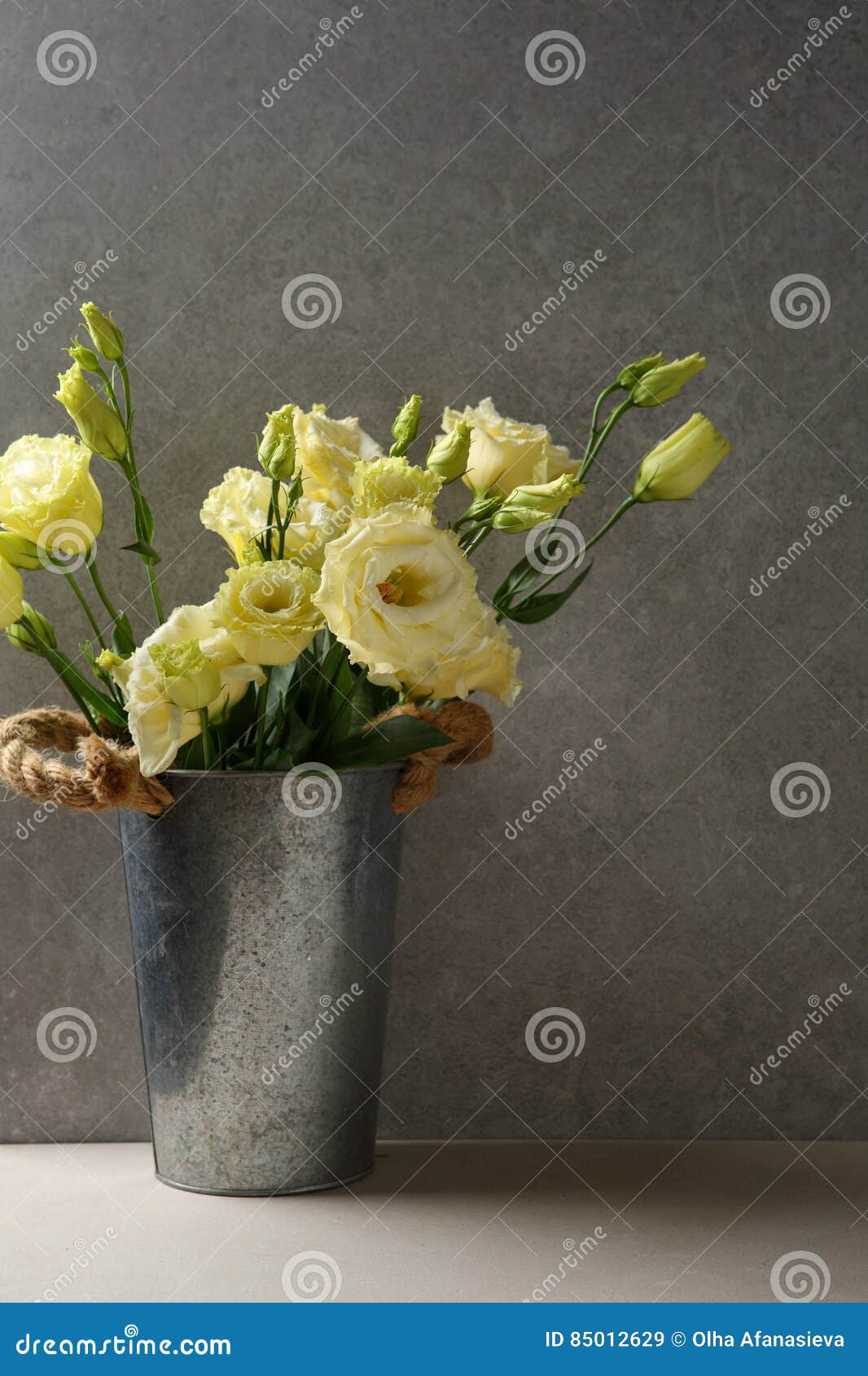 Yellow lisianthus in vase stock image. Image of pitcher - 85012629