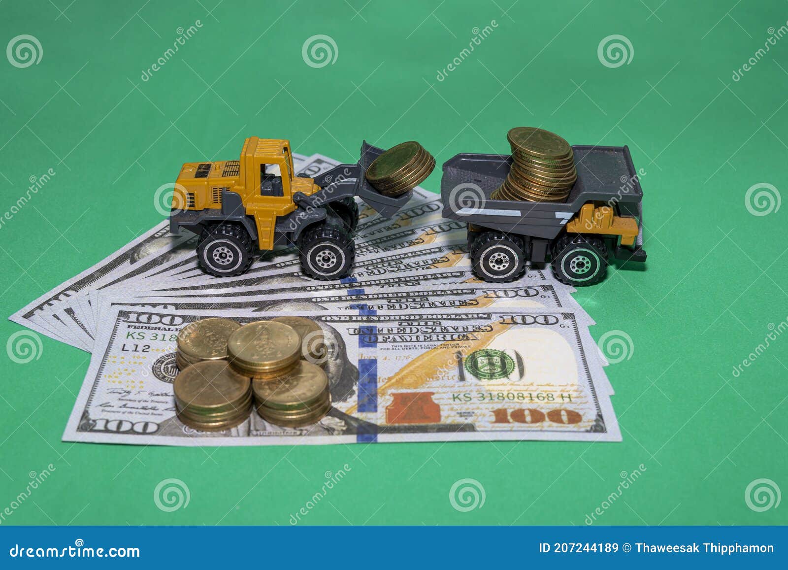 A Yellow Loader Is Scooping Coins To Put A Dump Truck On Dollar Bills ...