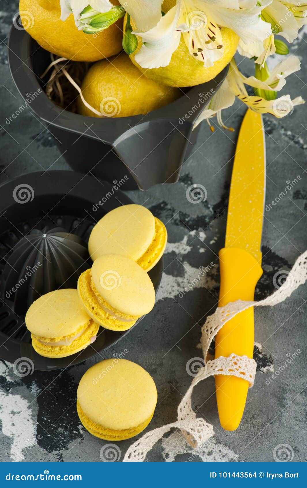 Yellow Macaroons with Lemons in Background Stock Photo - Image of ...