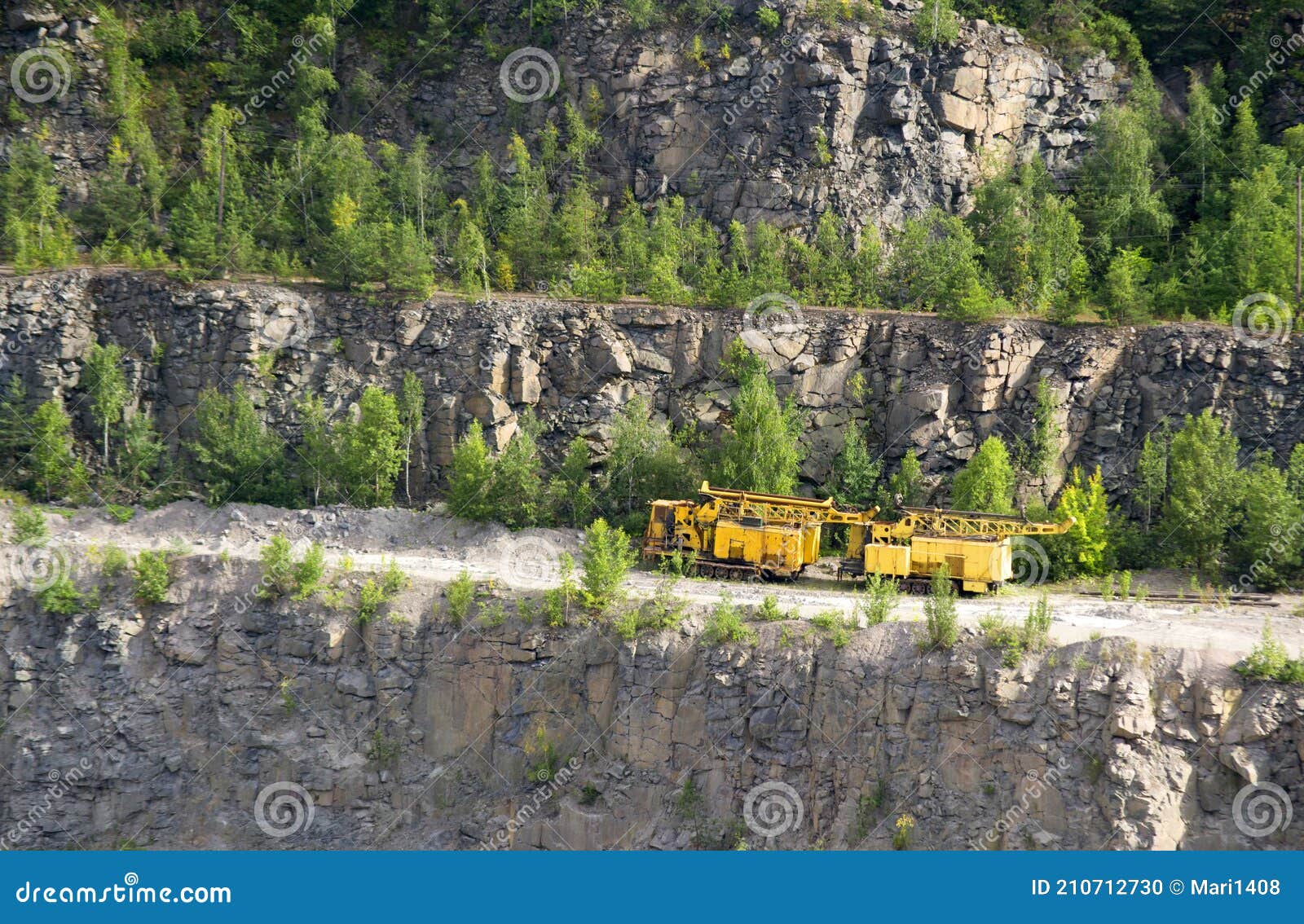 Yellow Machines for the Extraction of Granite Stock Photo - Image of ...