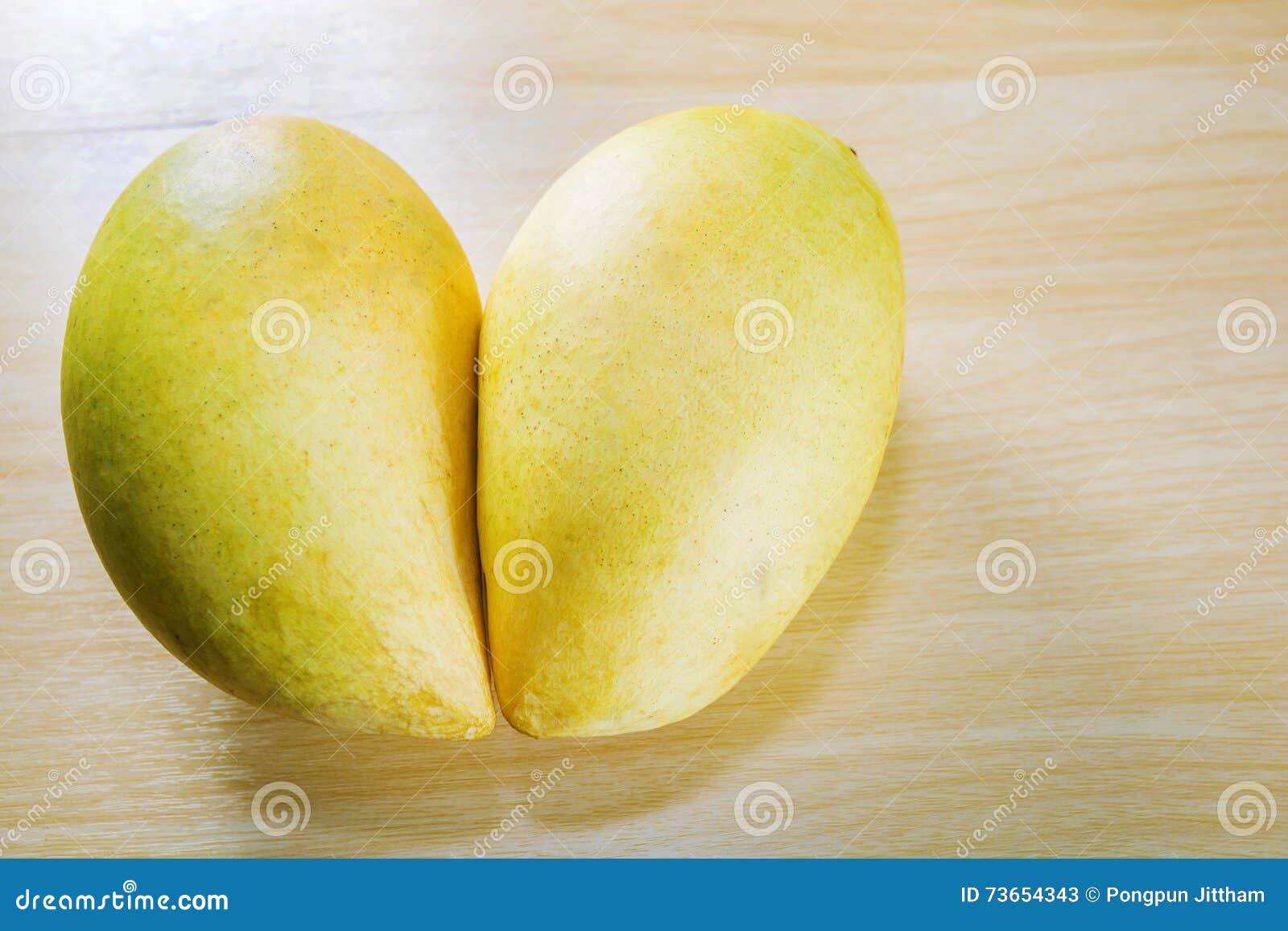 Yellow Mangoes Royalty-Free Stock Photography | CartoonDealer.com #73654343