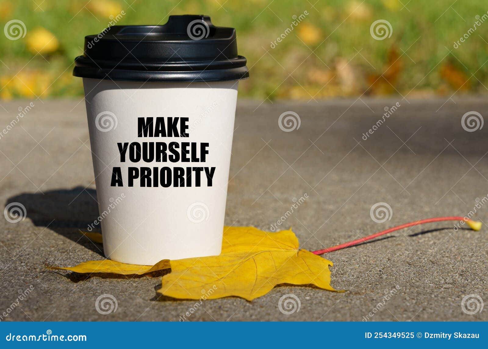 On a Yellow Maple Leaf There is a Cup of Coffee on Which is Written ...