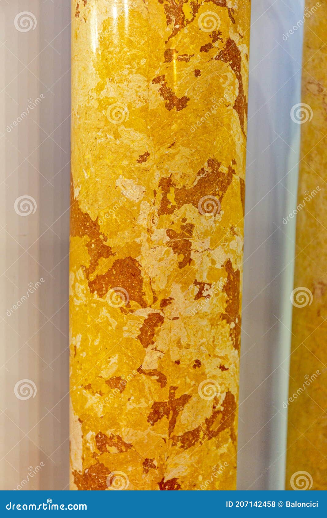 Yellow Marble Pillar stock photo. Image of exterior - 207142458