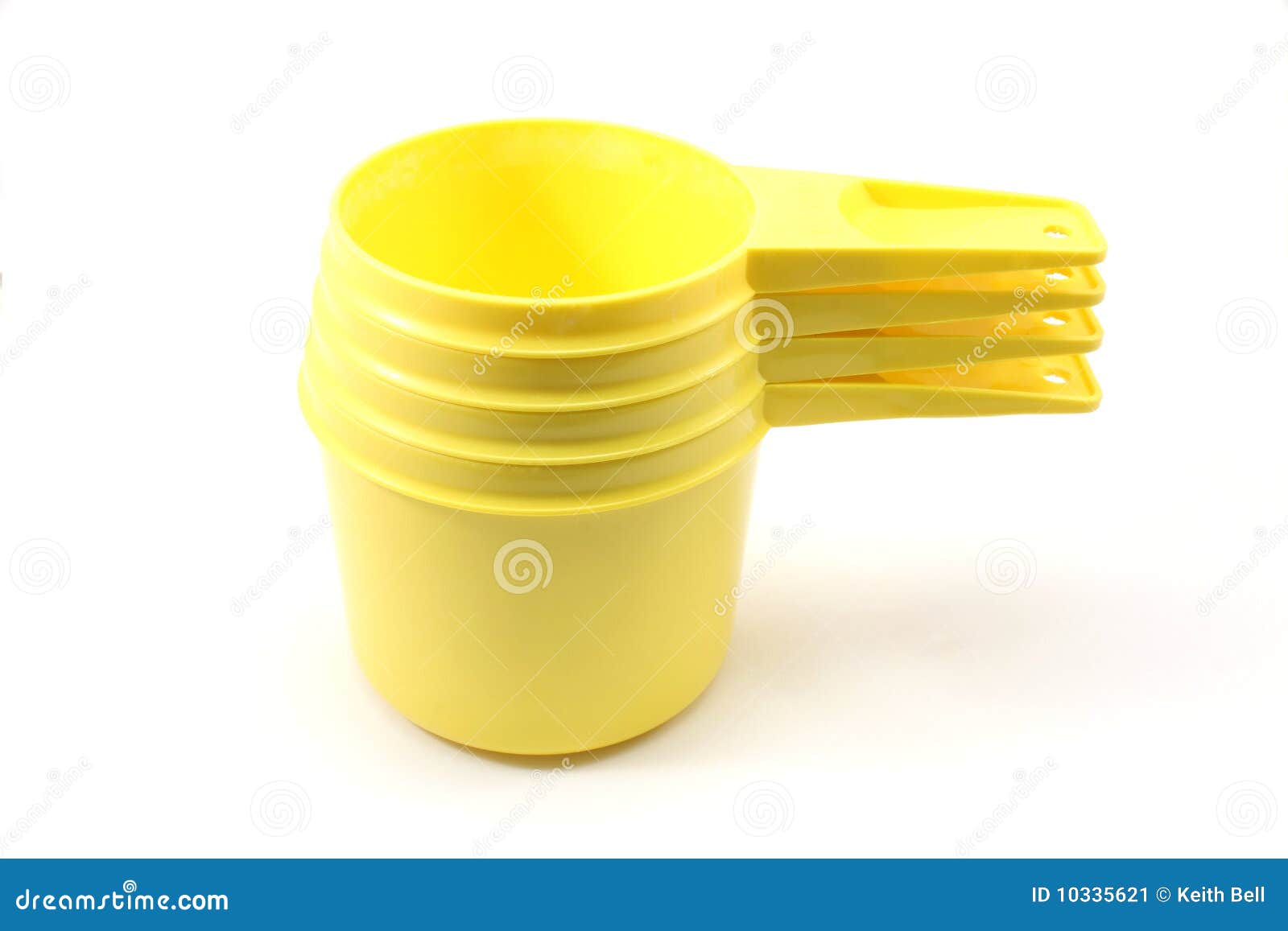 Yellow Measuring Cups stock image. Image of utensil, utensils - 10335621