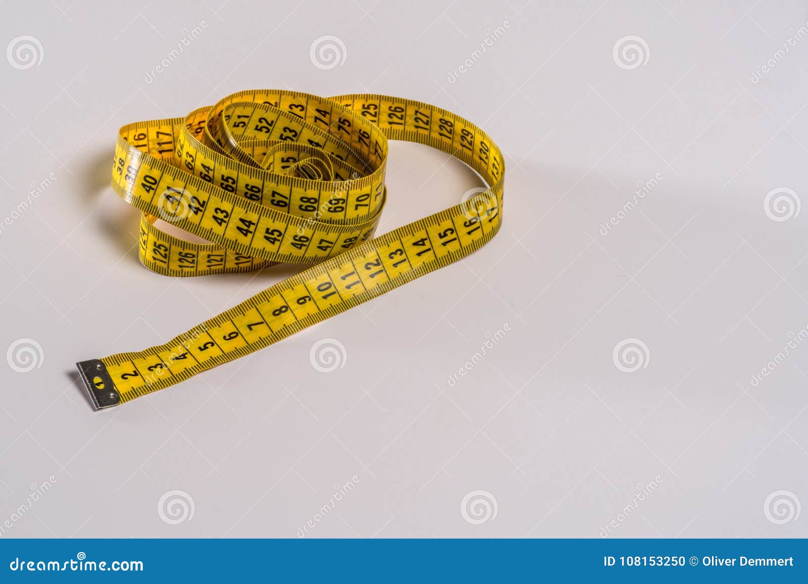 A Yellow Measuring Tape Isolated on White. Stock Photo - Image of ...