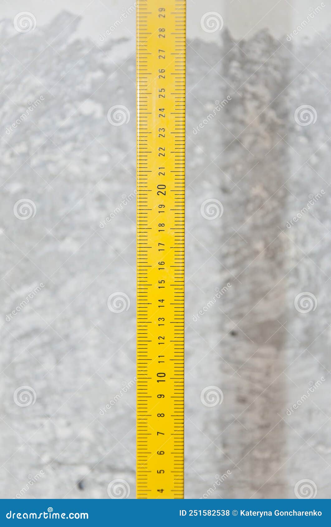 Yellow Metal Ruler Measuring Tool Cement Background Stock Photo - Image ...