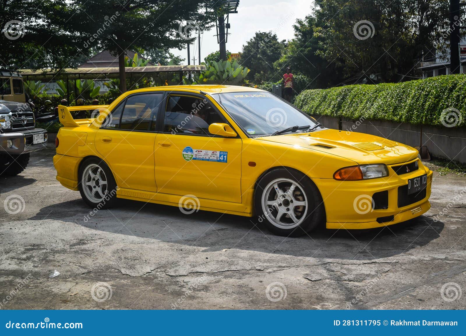 Yellow Mitsubishi Lancer Evolution III Leaving JDM Run Car Meet ...