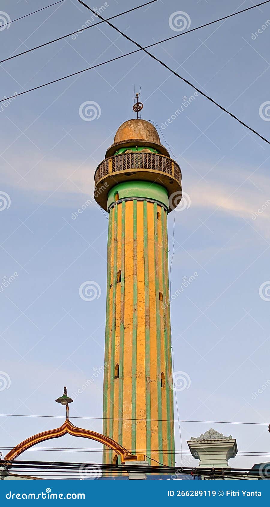 Yellow Mosque Minaret with Blue Sky Background Stock Image - Image of ...