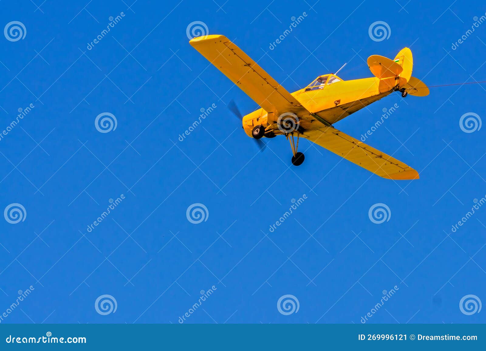 Yellow Motorized Aircraft in the Blue Sky Stock Image - Image of ...