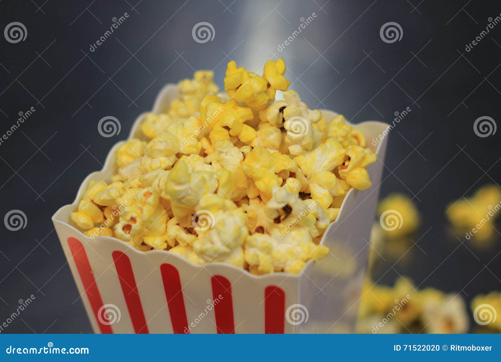 Yellow movie popcon stock photo. Image of closeup, popcorn - 71522020