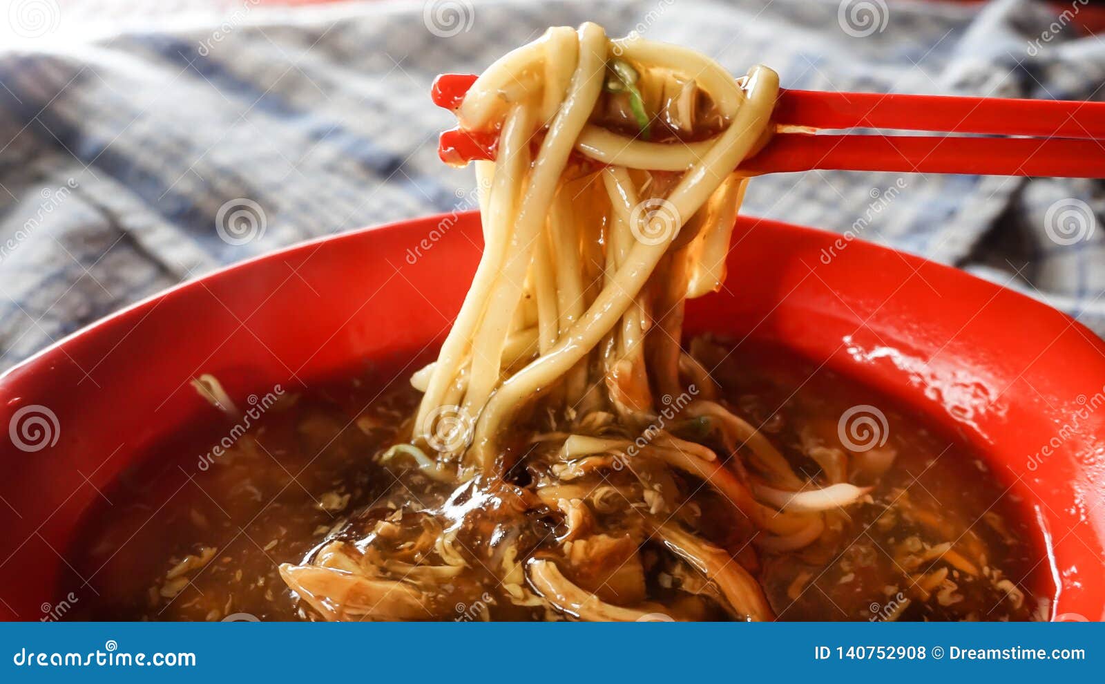 Yellow Noodle and the Red Chopstick Stock Photo - Image of chopstick ...