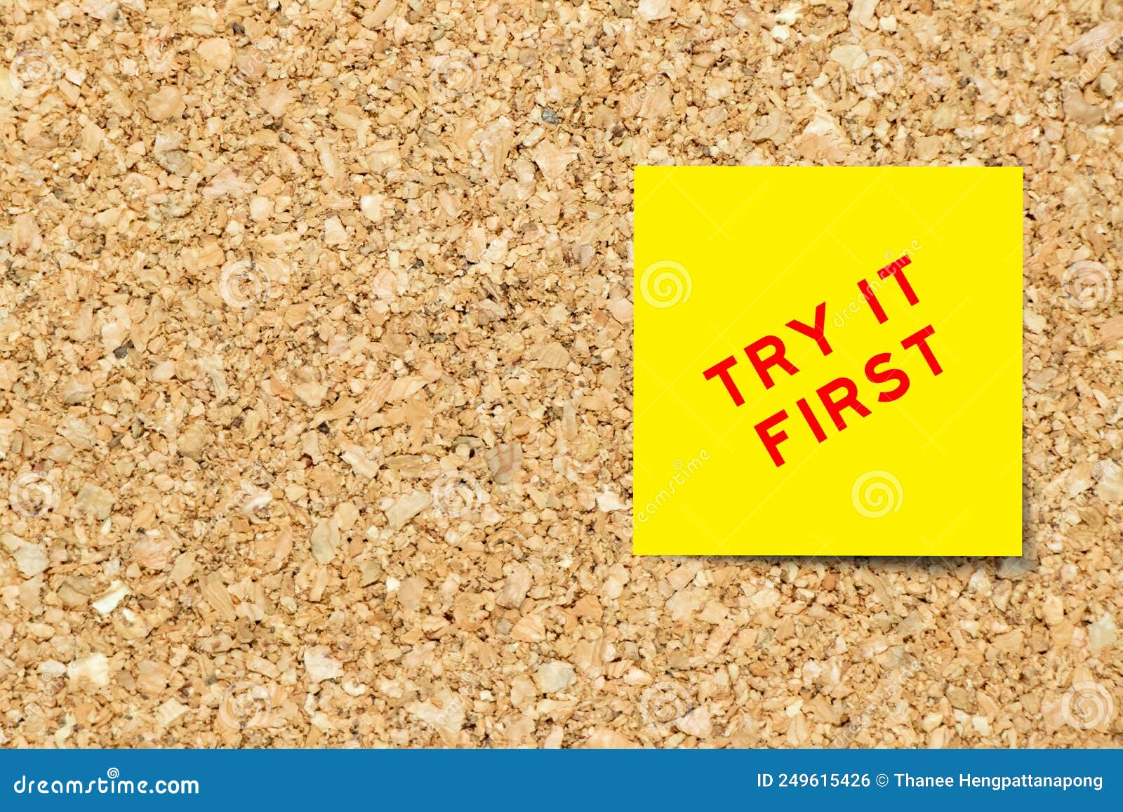 Yellow Notepaper with Word Try it First on Cork Board Background with ...