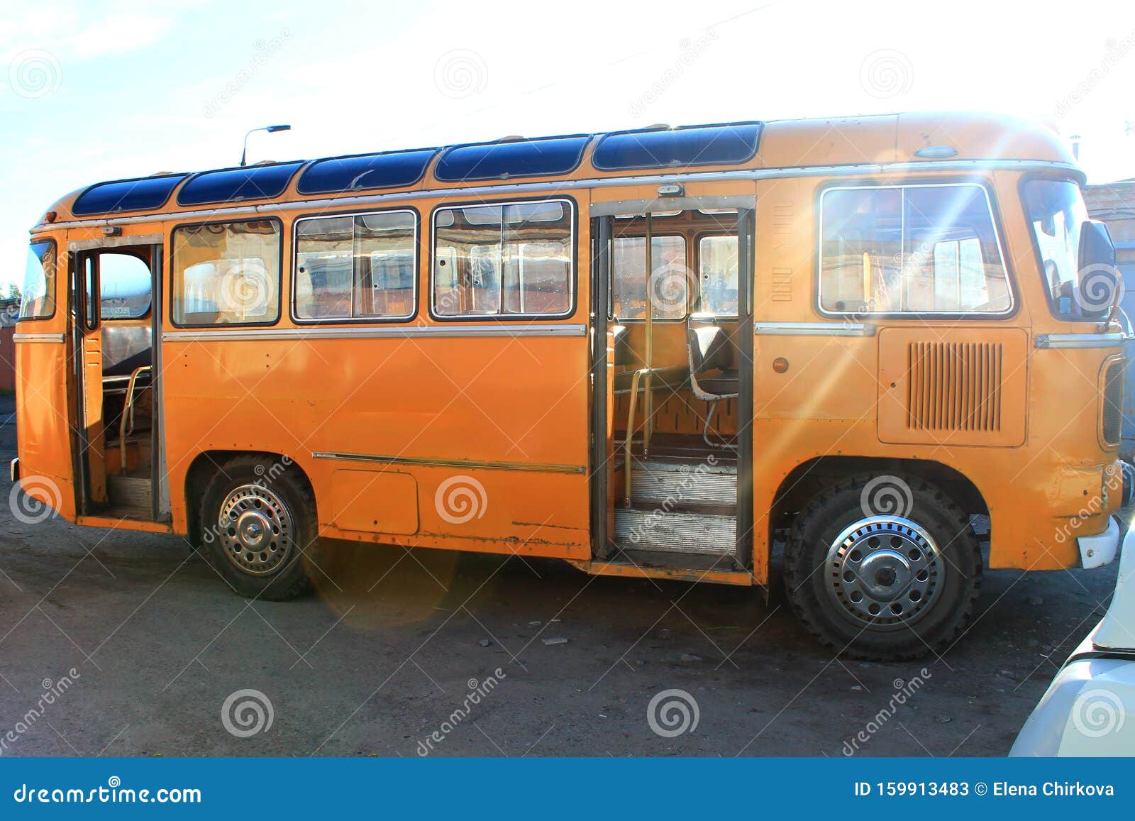 Yellow Old Bus with Open Doors on the Street Stock Image - Image of ...