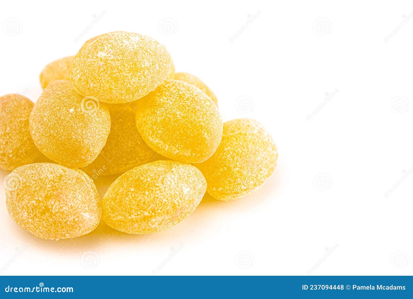 Yellow Old Fashioned Hard Candies on a White Background Stock Photo ...