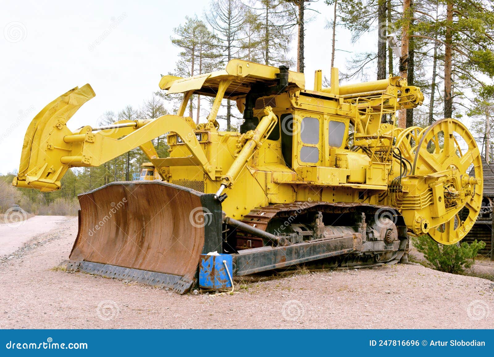 Yellow Old Mining Bulldozer Stands Rusting in the Forest Editorial ...