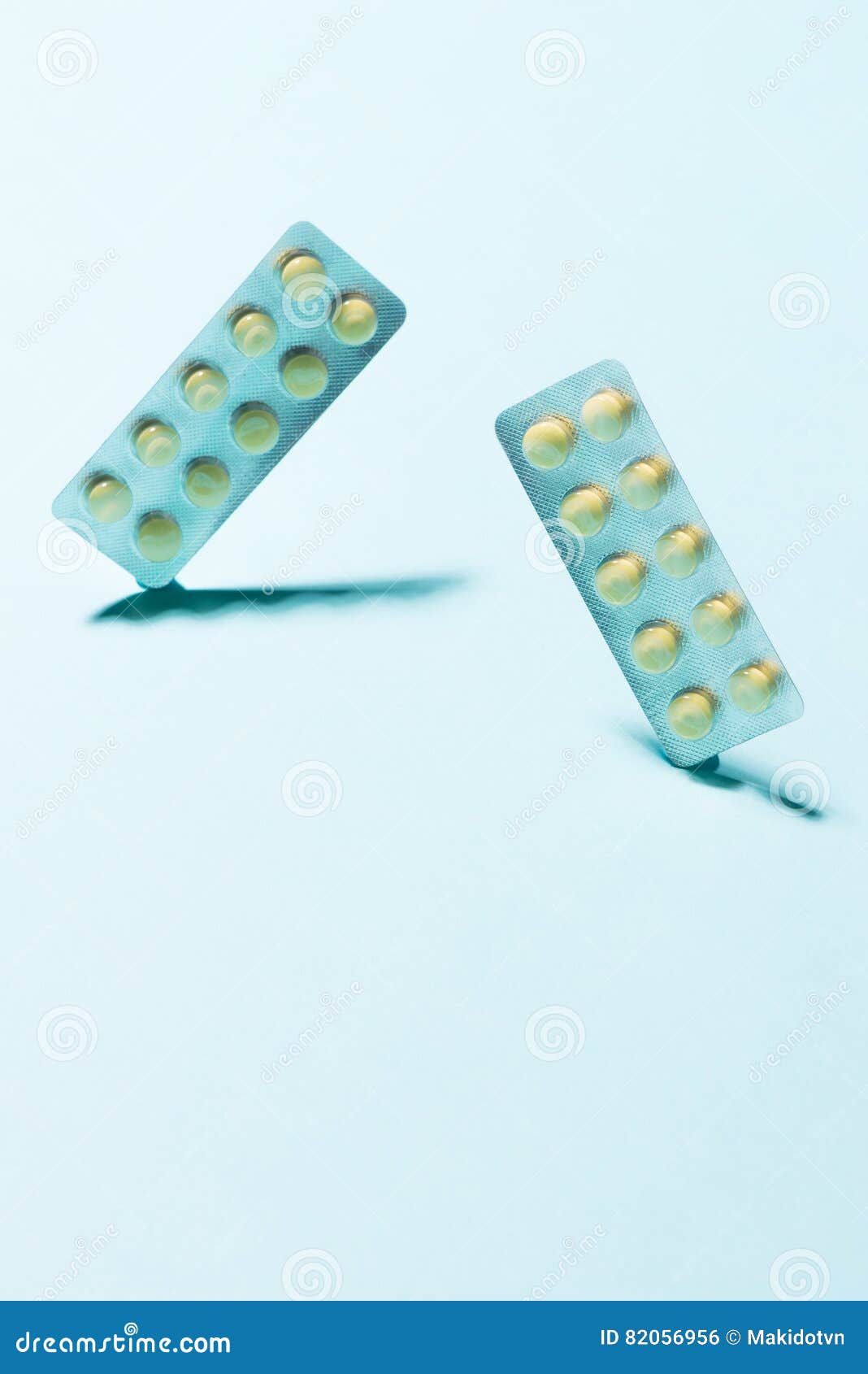 Yellow Oral Contraceptive Pill Strips On Blue Background With Sh Stock ...