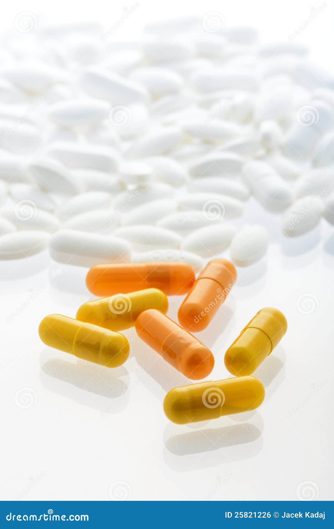 Yellow and orange capsules stock photo. Image of medicinal - 25821226