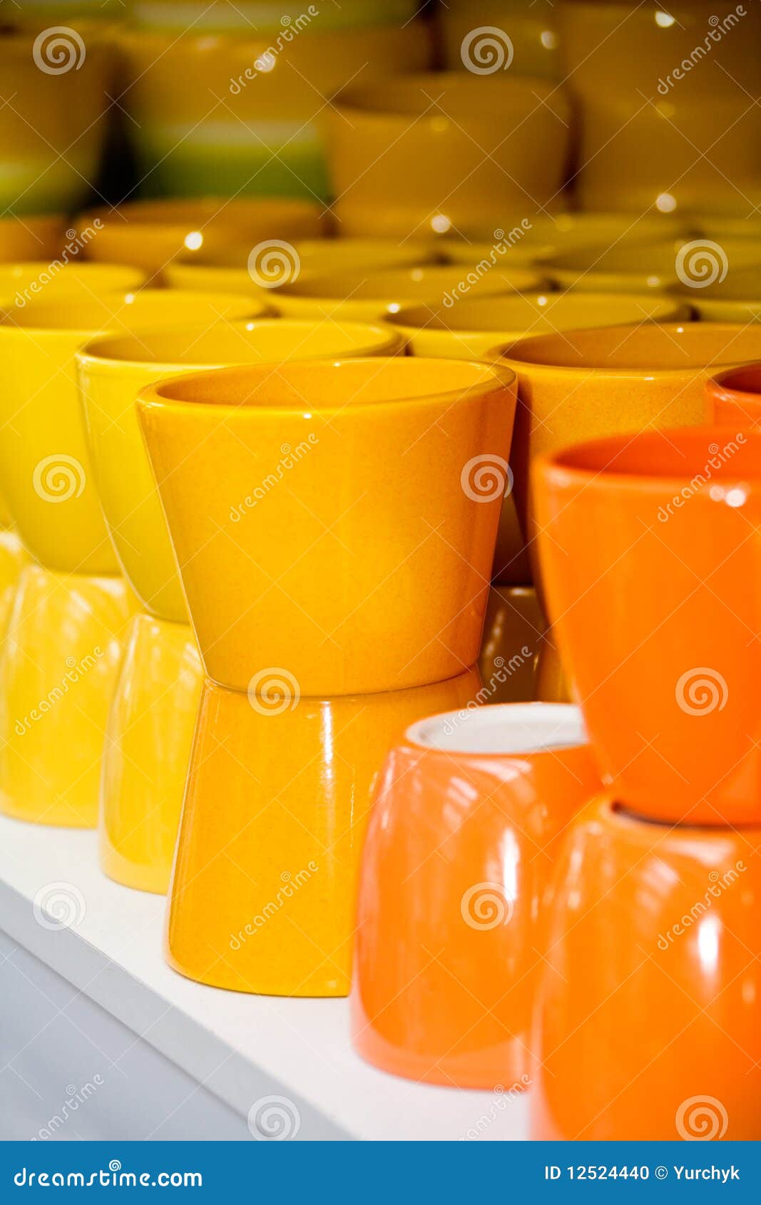 Yellow and Orange Ceramic Cups Stock Photo - Image of texture ...